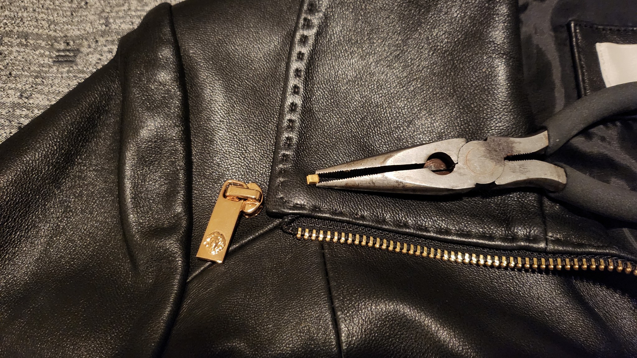 Converting a one-way zipper to a two-way zipper—without removing the ...