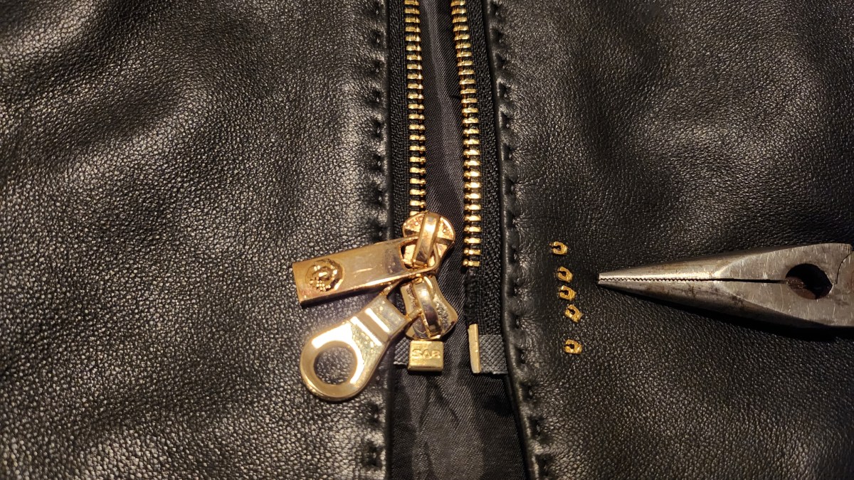 Converting a one-way zipper to a two-way zipper—without removing the ...