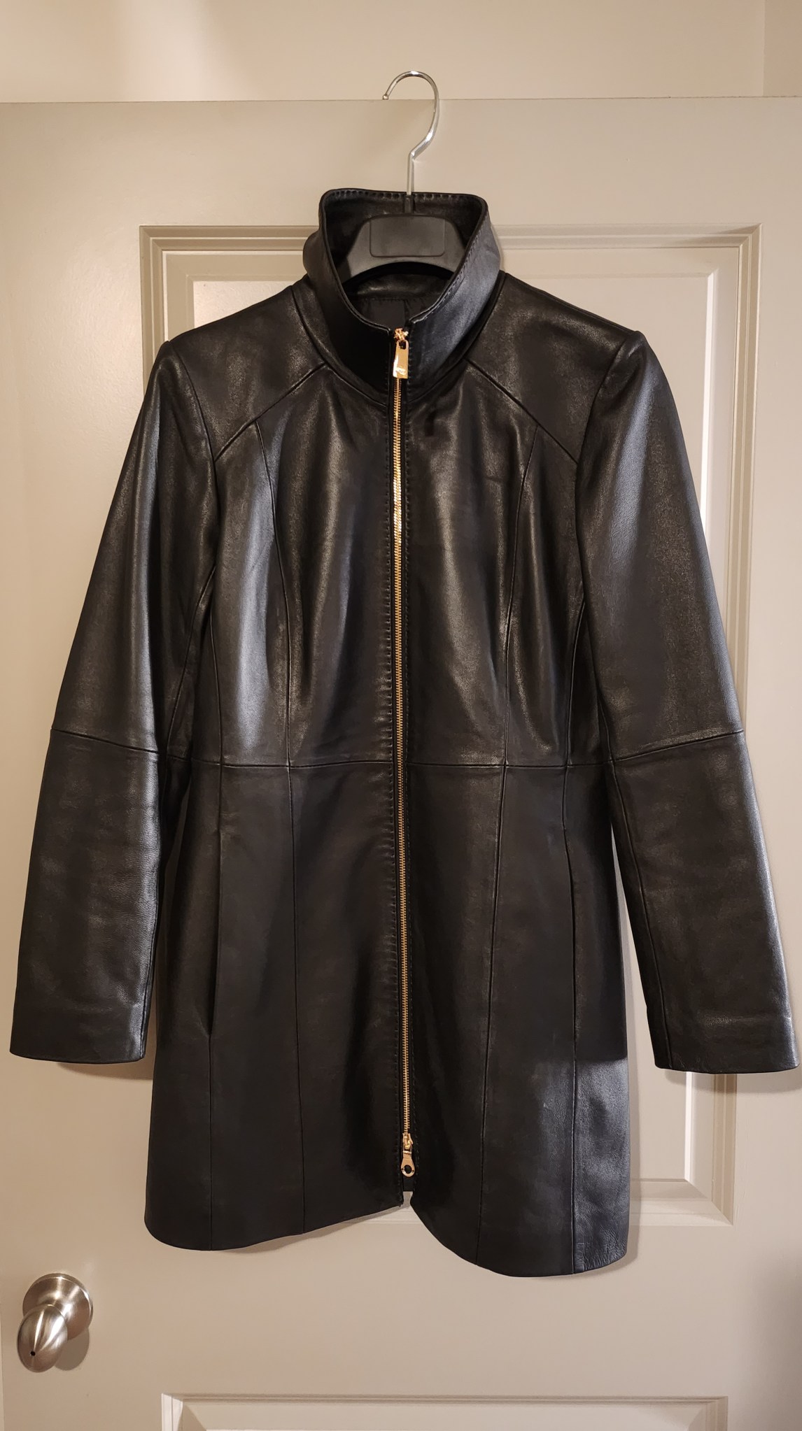 Converting a one-way zipper to a two-way zipper—without removing the ...